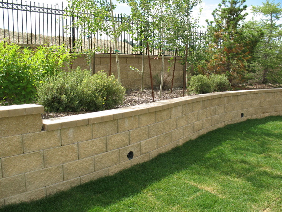 11 Ways to Stop Retaining Walls from Falling - Organize With Sandy