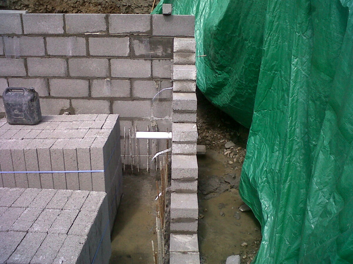 How to Fix Weep Holes in Retaining Wall - Organize With Sandy